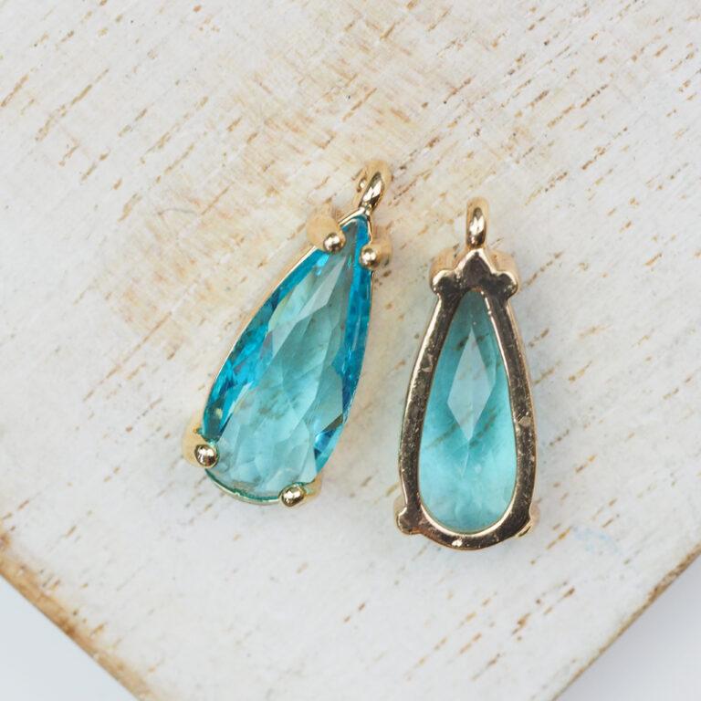 Pear glass drops in metal settings
